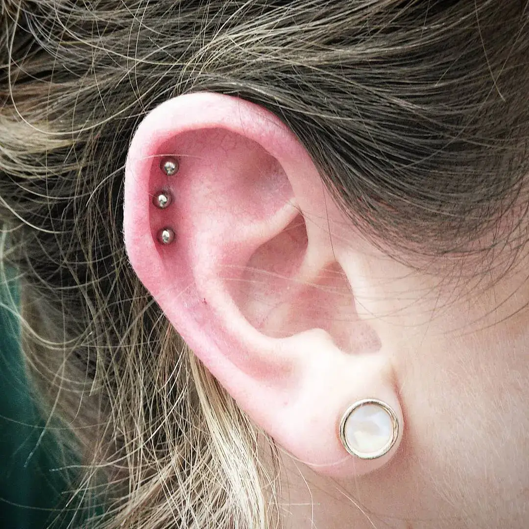 Triple Helix Piercing: A Modern Twist on Timeless Elegance - The Body Rings